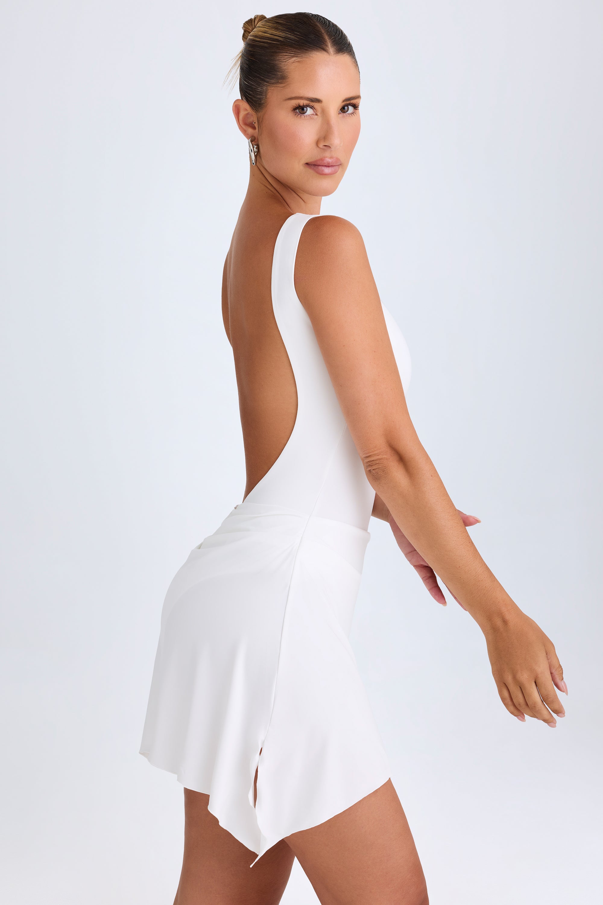 Shirin Draped Open-Back Mini Dress in White | Oh Polly