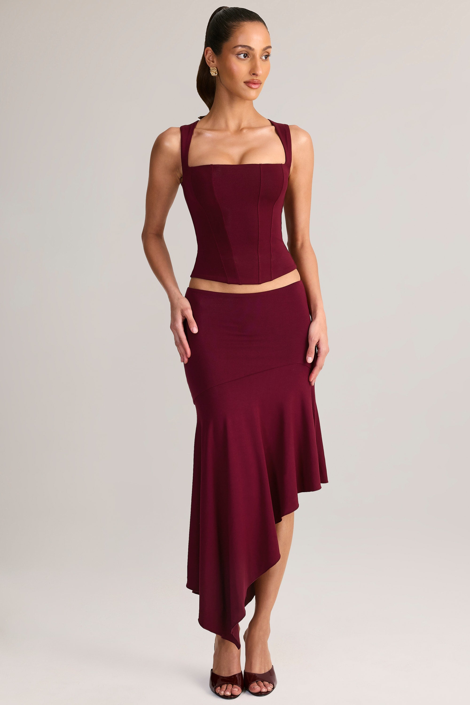 Niva Modal Asymmetric Low-Rise Midaxi Skirt in Wine | Oh Polly