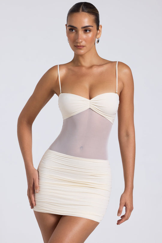 Eislyn Sheer Panelled Ruched Mini Dress in Ivory | Oh Polly