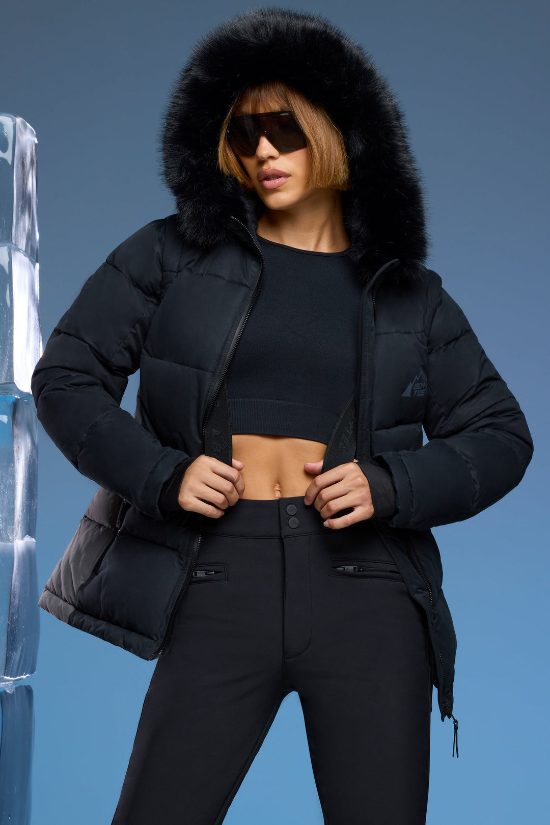 Alpine Ski Jacket with Detachable Sleeves in Black | Oh Polly