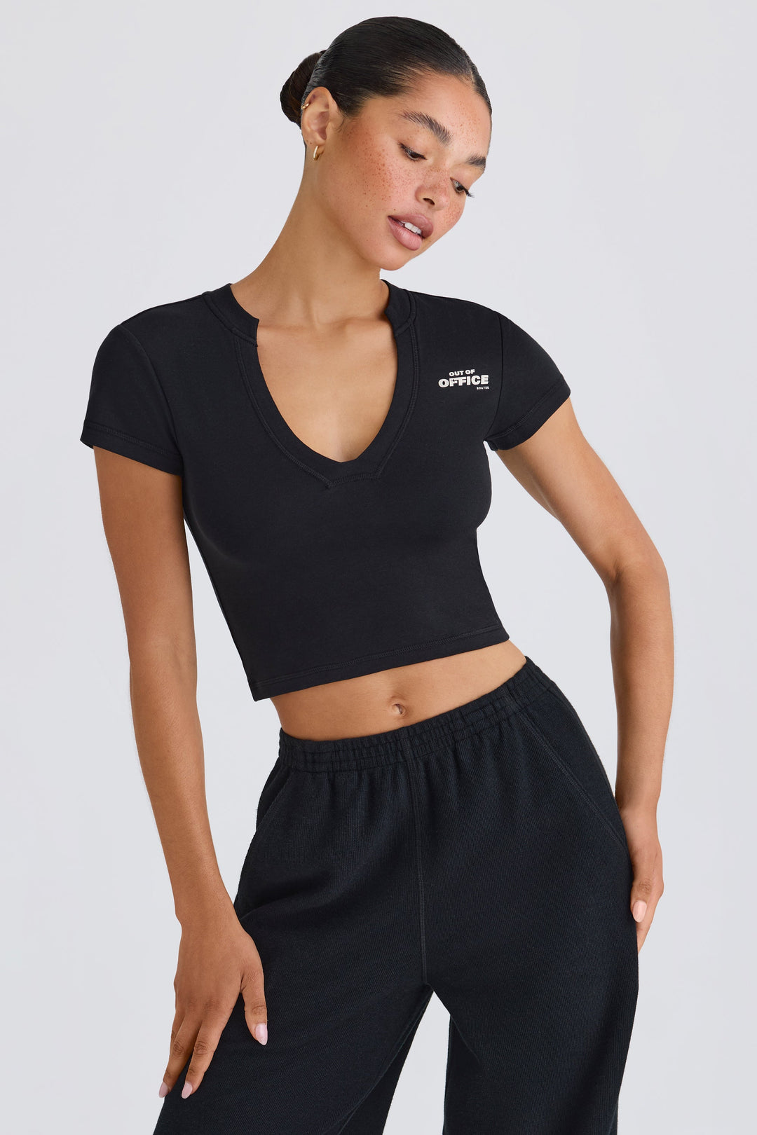 Jet Set Graphic-Print Cropped T-Shirt in Black | Oh Polly