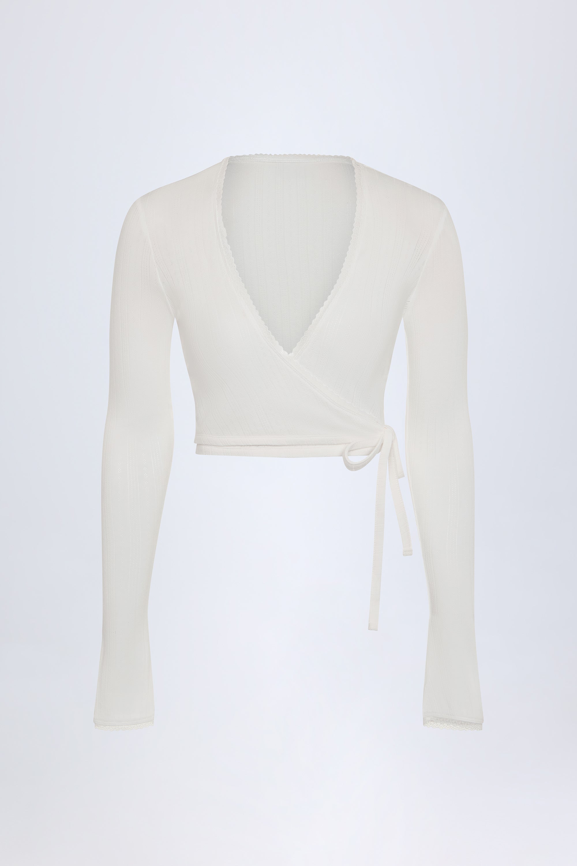 Lou Pointelle Wrap Crop Top in White | Oh Polly