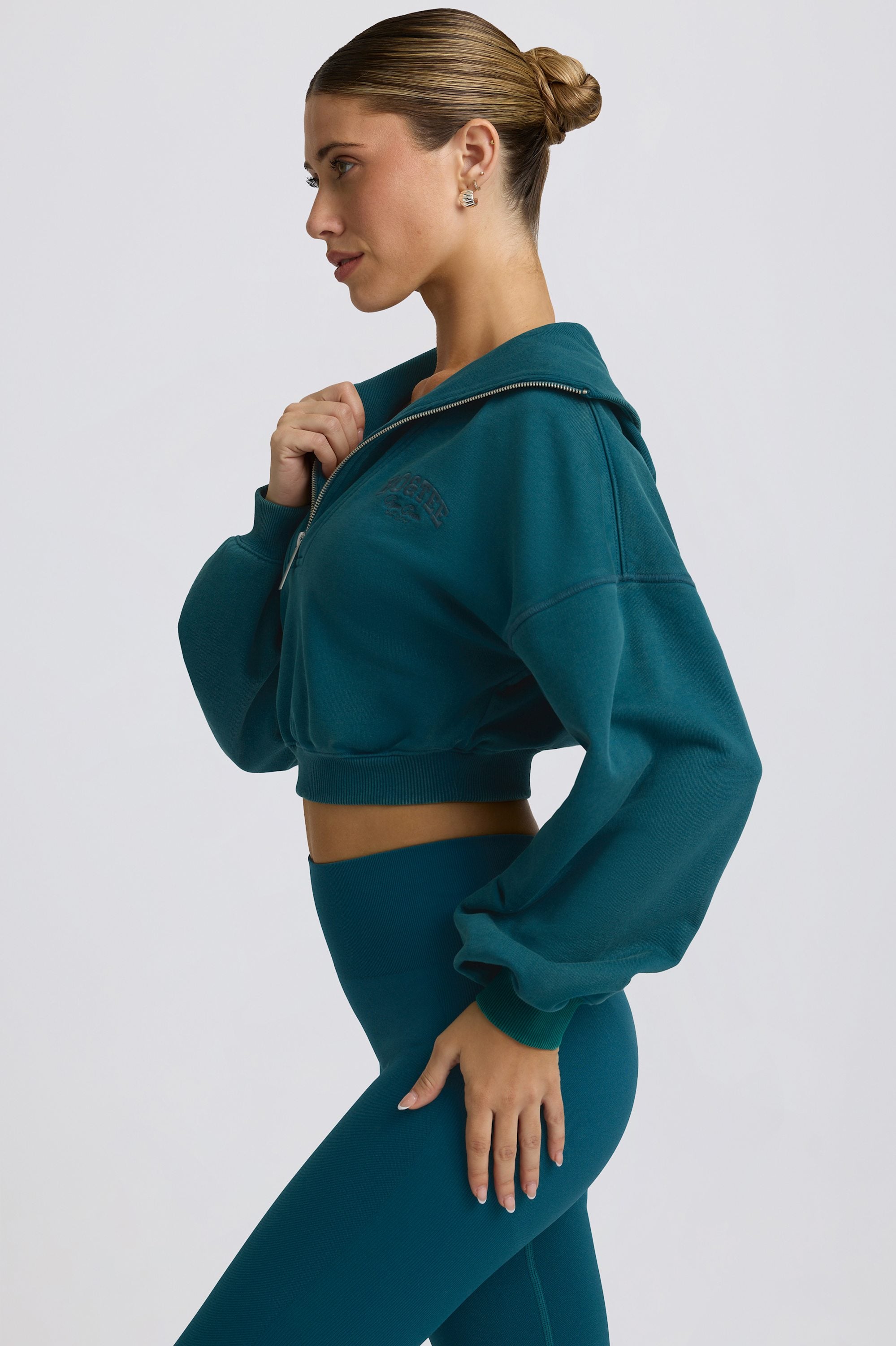 Quarter-Zip Cropped Sweatshirt in Teal | Oh Polly